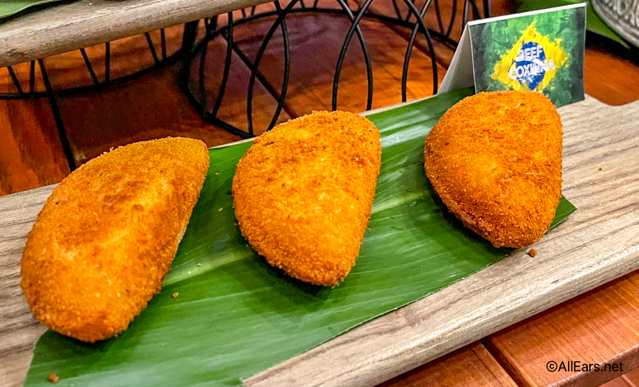 2022 uo universal studios mardi gras food mardi gras beef coxinha ...